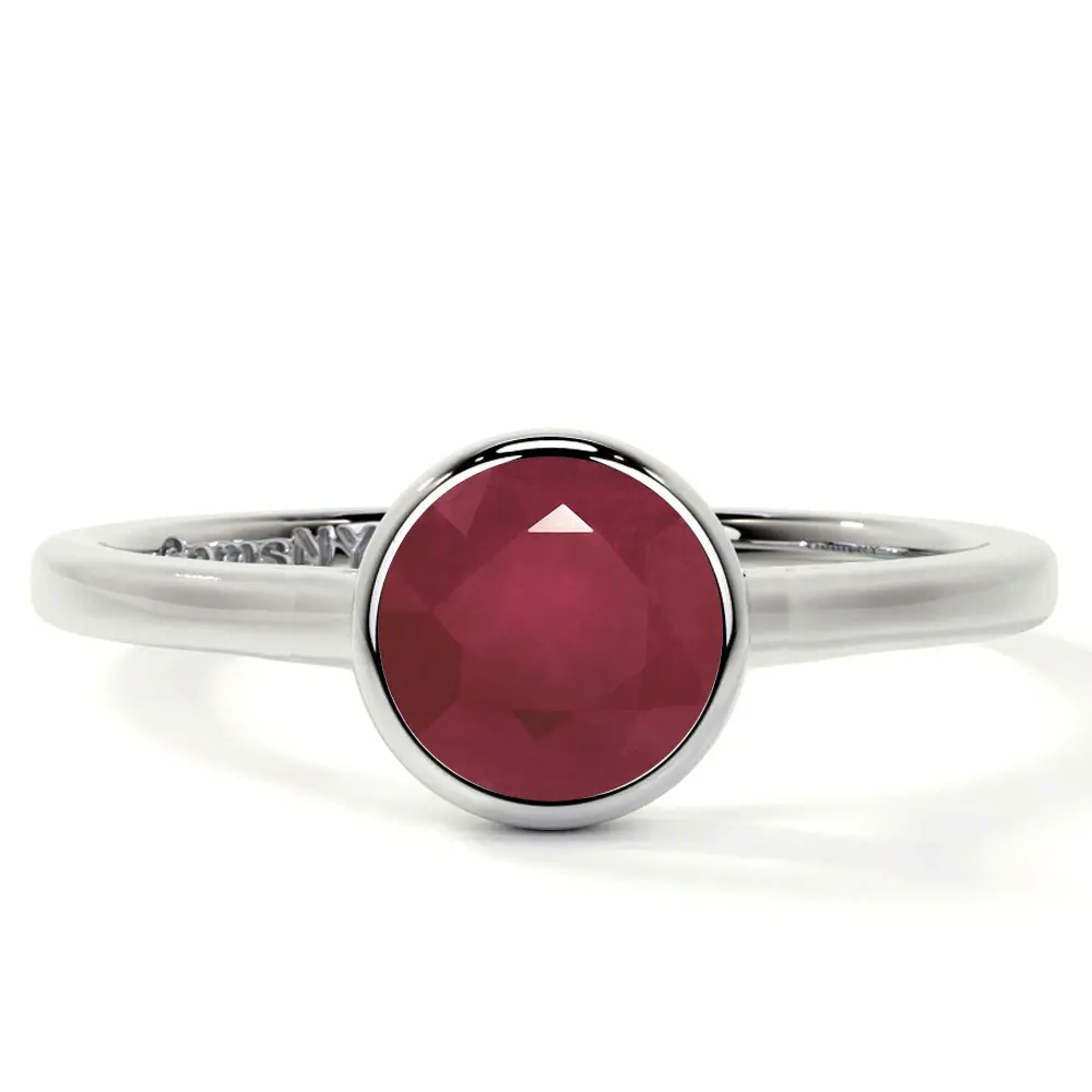 Bezel Set Round Ruby Solitaire Ring (0.65cts.) A Quality